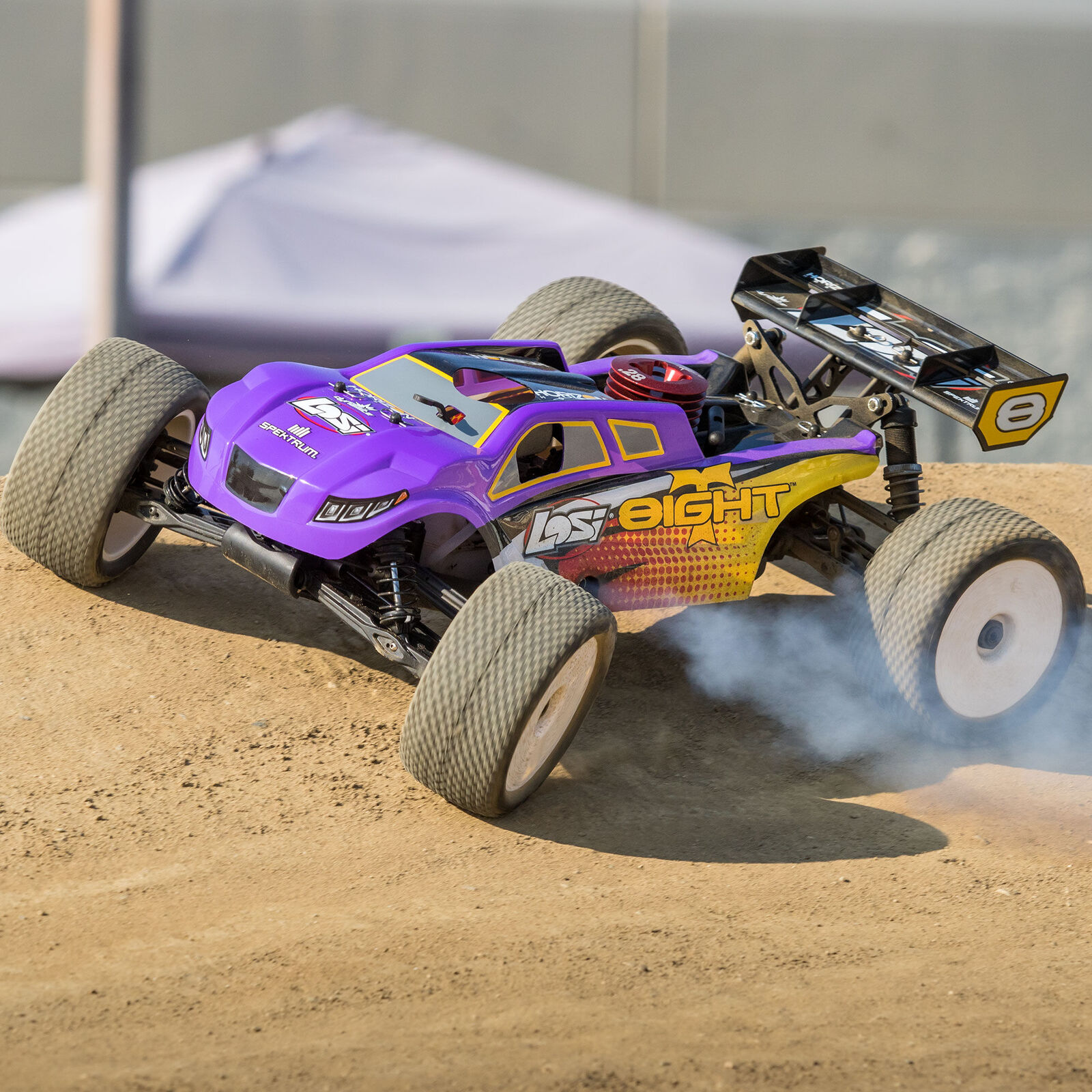 Losi 1/8 8IGHT-T 4X4 Nitro Truggy RTR, Purple/Yellow | Horizon Hobby